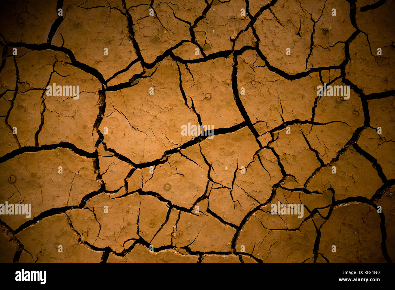 Dry land. Cracked ground background Stock Photo - Alamy