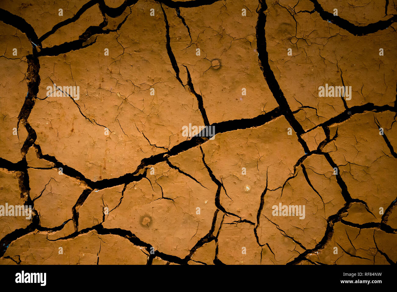 Dry land. Cracked ground background Stock Photo - Alamy