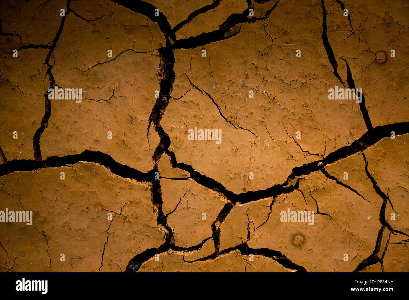 Dry land. Cracked ground background Stock Photo - Alamy
