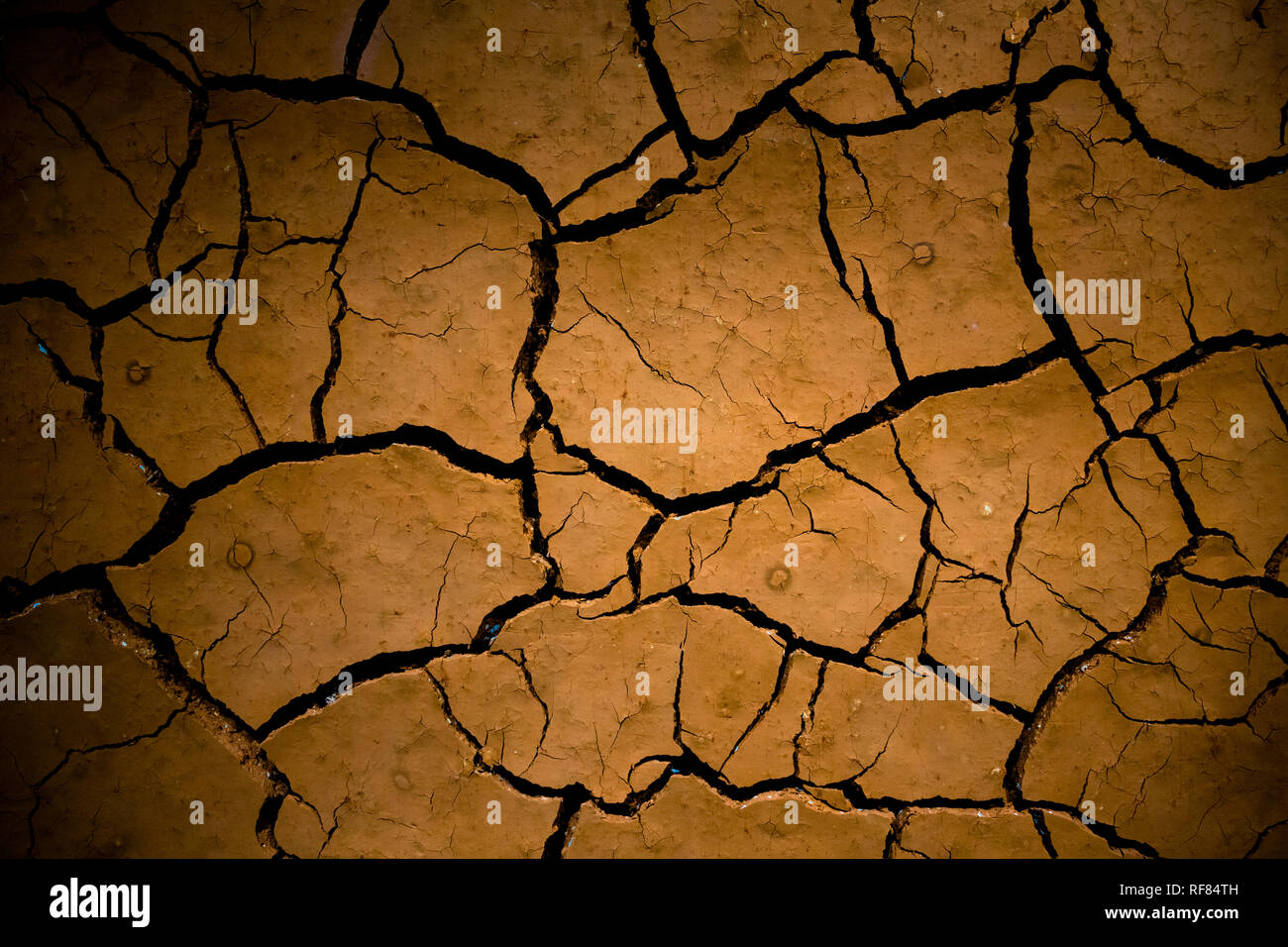 Dry land. Cracked ground background Stock Photo - Alamy