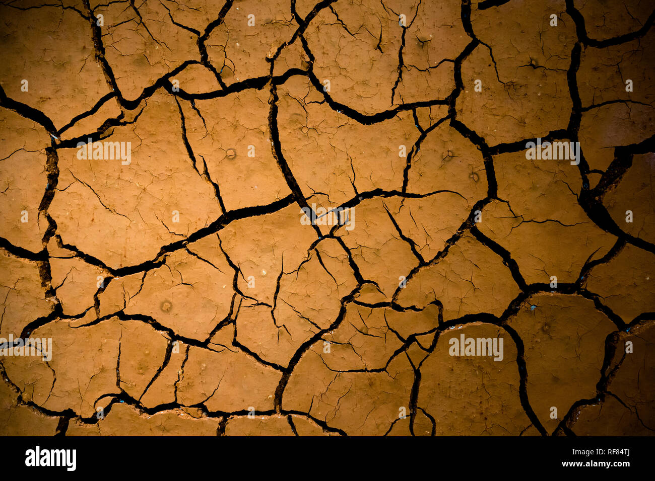 Dry land. Cracked ground background Stock Photo - Alamy
