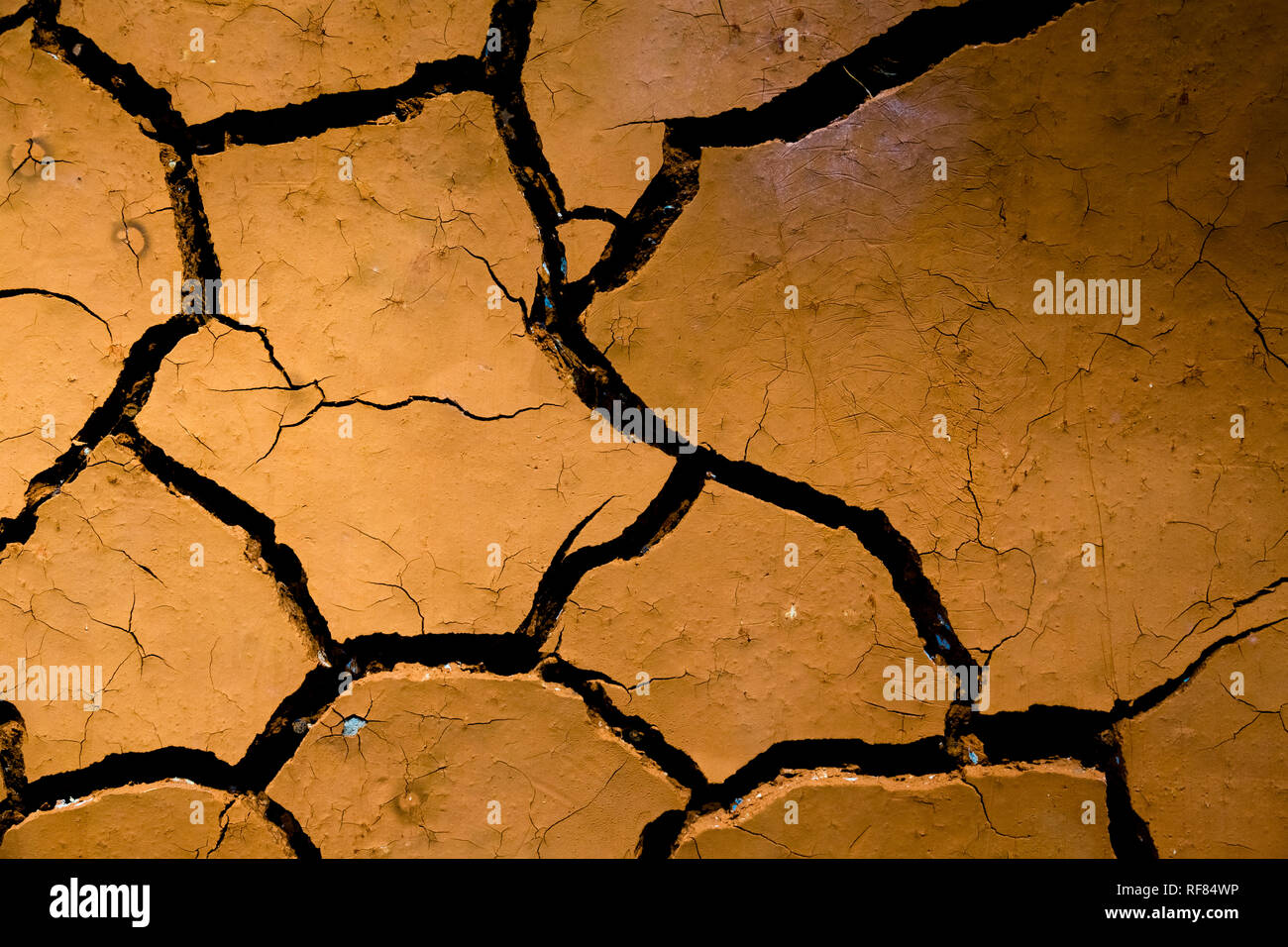 Dry land. Cracked ground background Stock Photo - Alamy