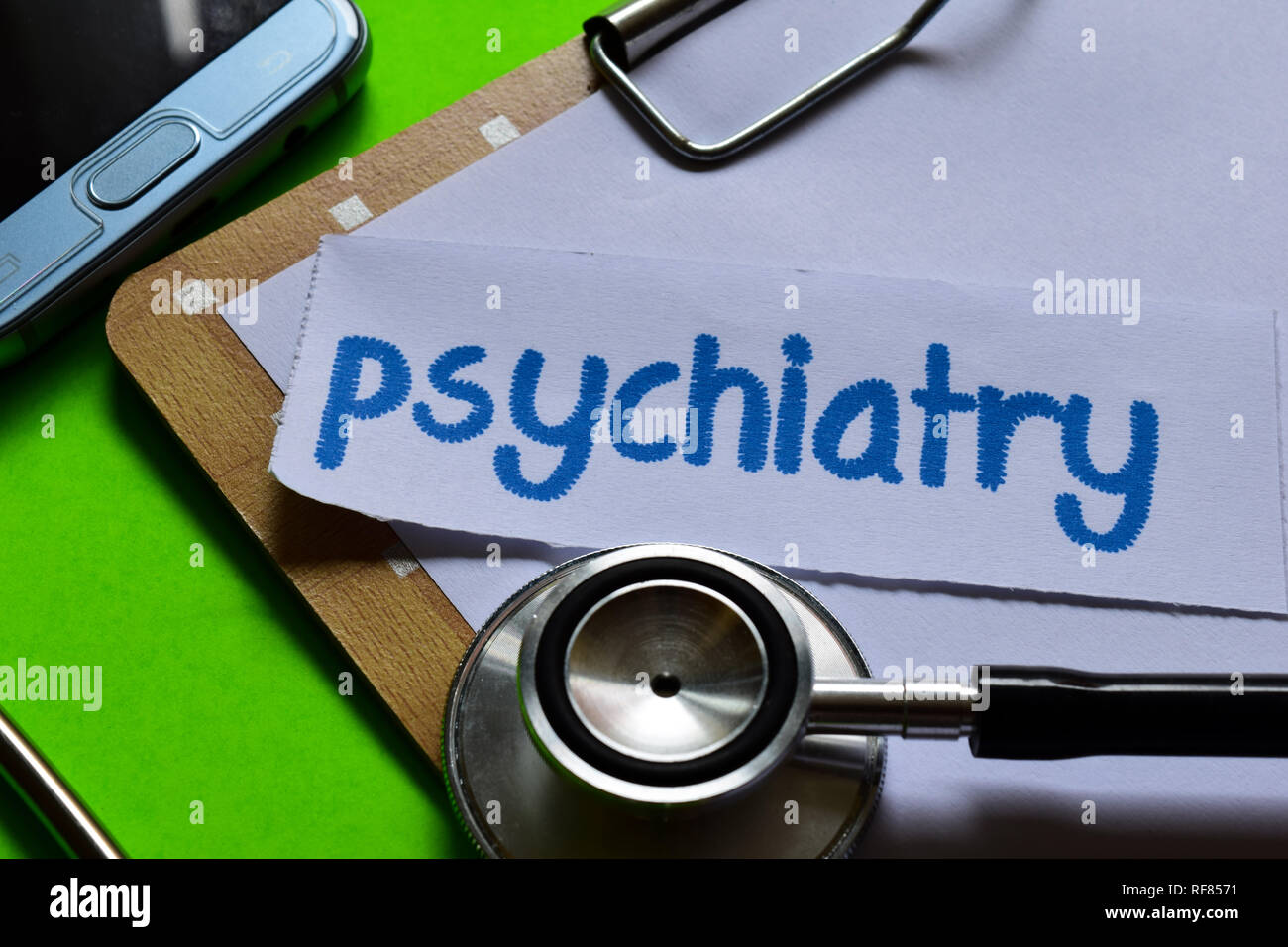 Psychiatry on healthcare concept inspiration with green background ...