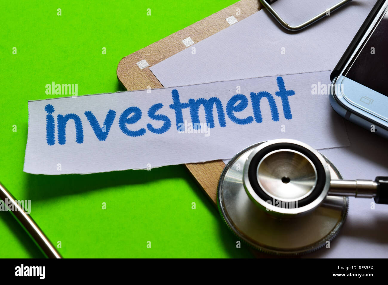 Investment on healthcare concept inspiration with green background ...