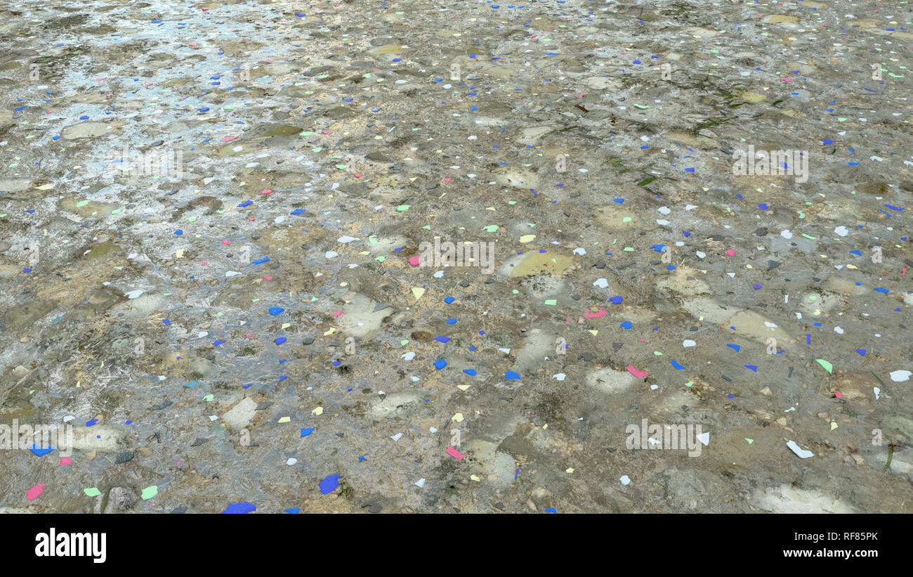 Microplastic on the beach- 3D Rendering Stock Photo - Alamy