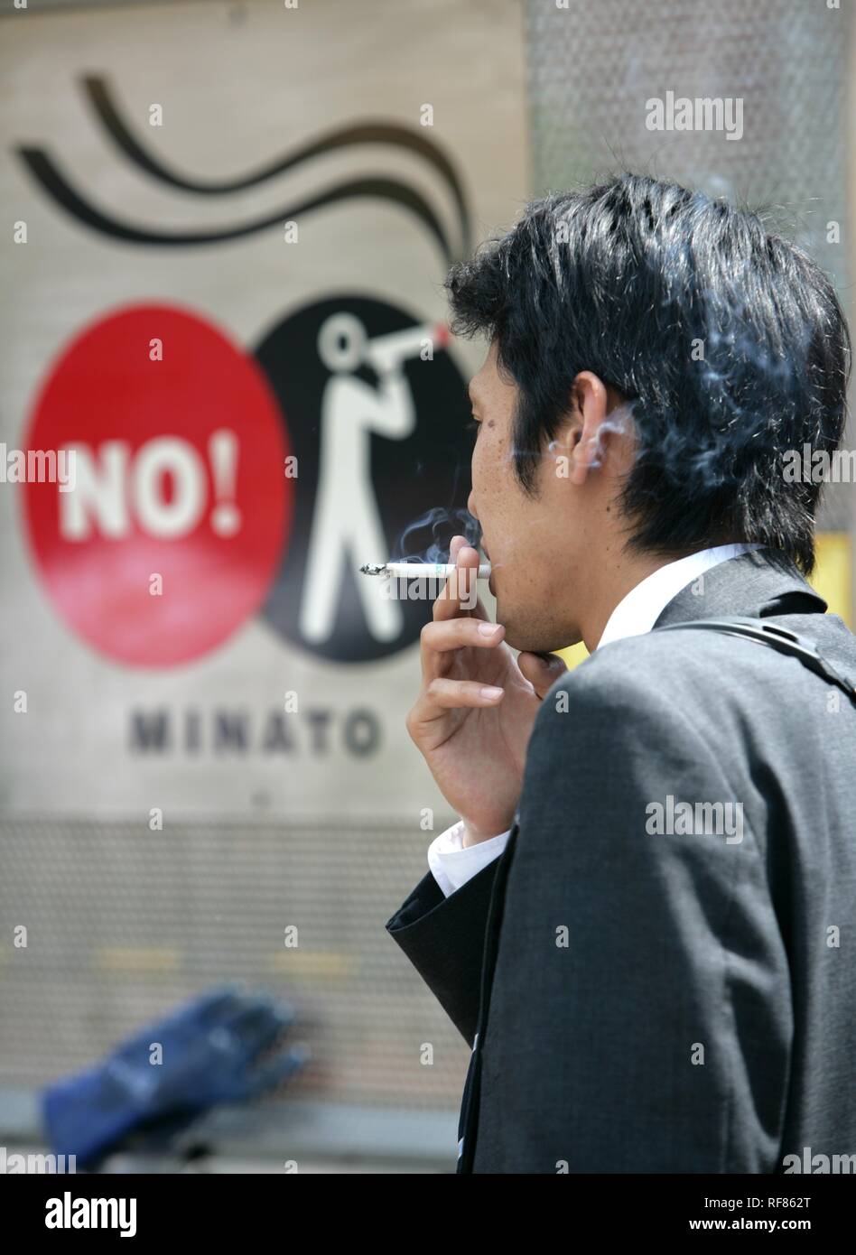 JPN, Japan, Tokyo: Smoker in Tokyo, official smoking area Stock Photo ...