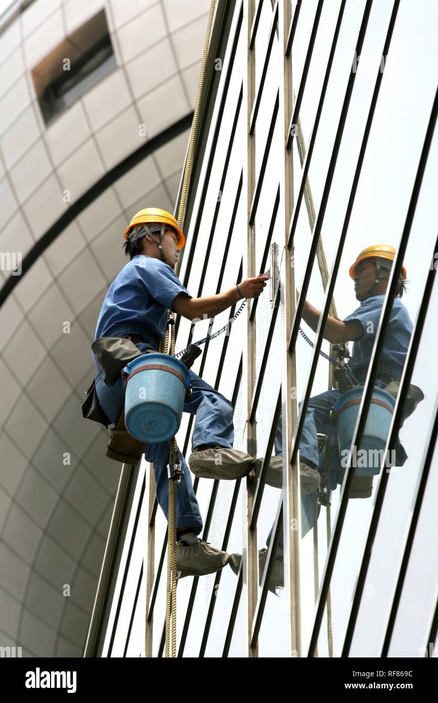 Window cleaner, glass facade of a skyscraper, Tokyo, Japan, Asia Stock ...