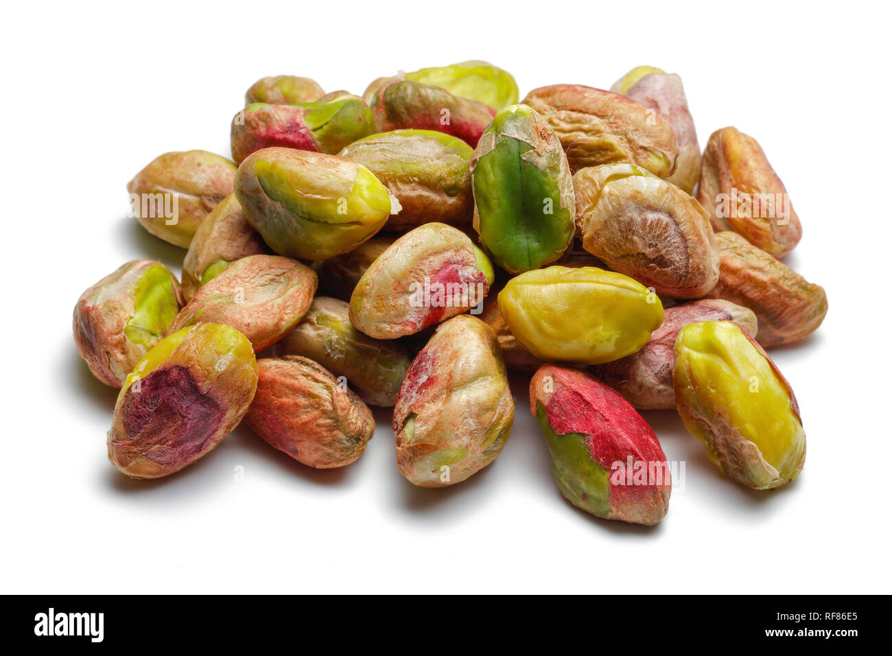 Peeled pistachio nuts isolated on white background Stock Photo - Alamy