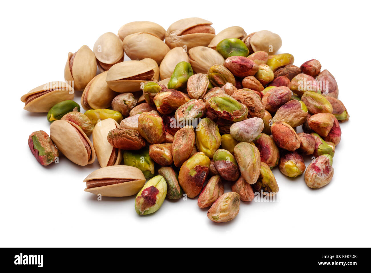 Peeled pistachio nuts isolated on white background Stock Photo - Alamy