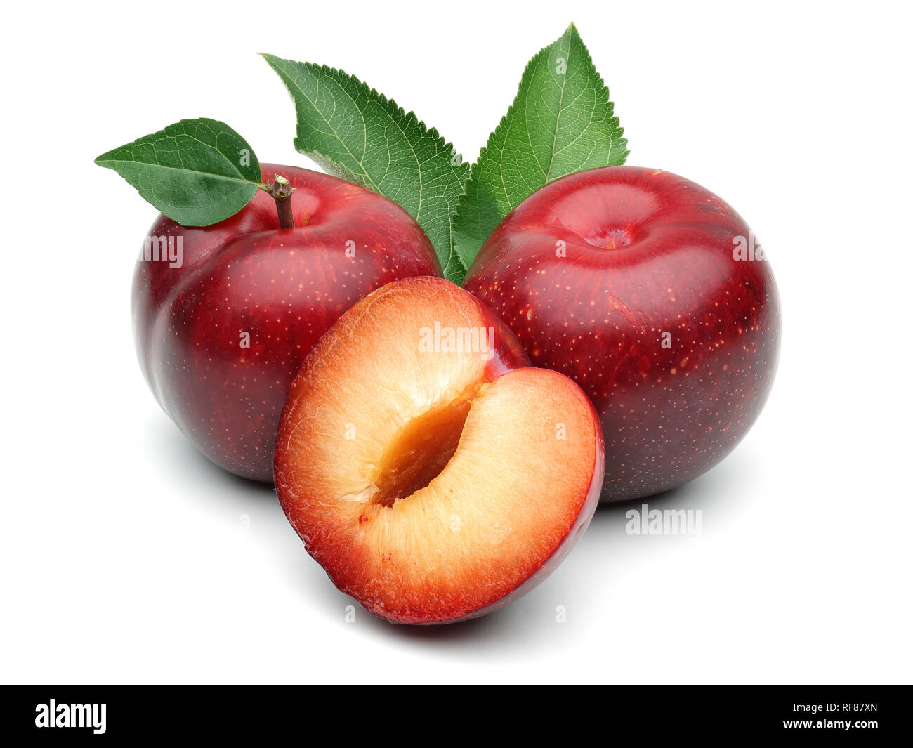 Red plums with leaves isolated on white background Stock Photo - Alamy