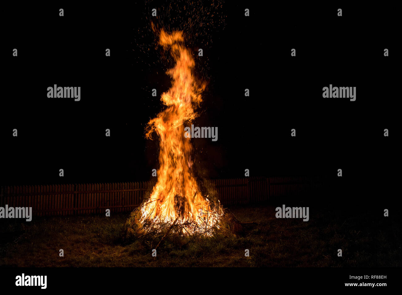 Outdoor bonfire. Camping in the nature outdoors in the woods and having ...