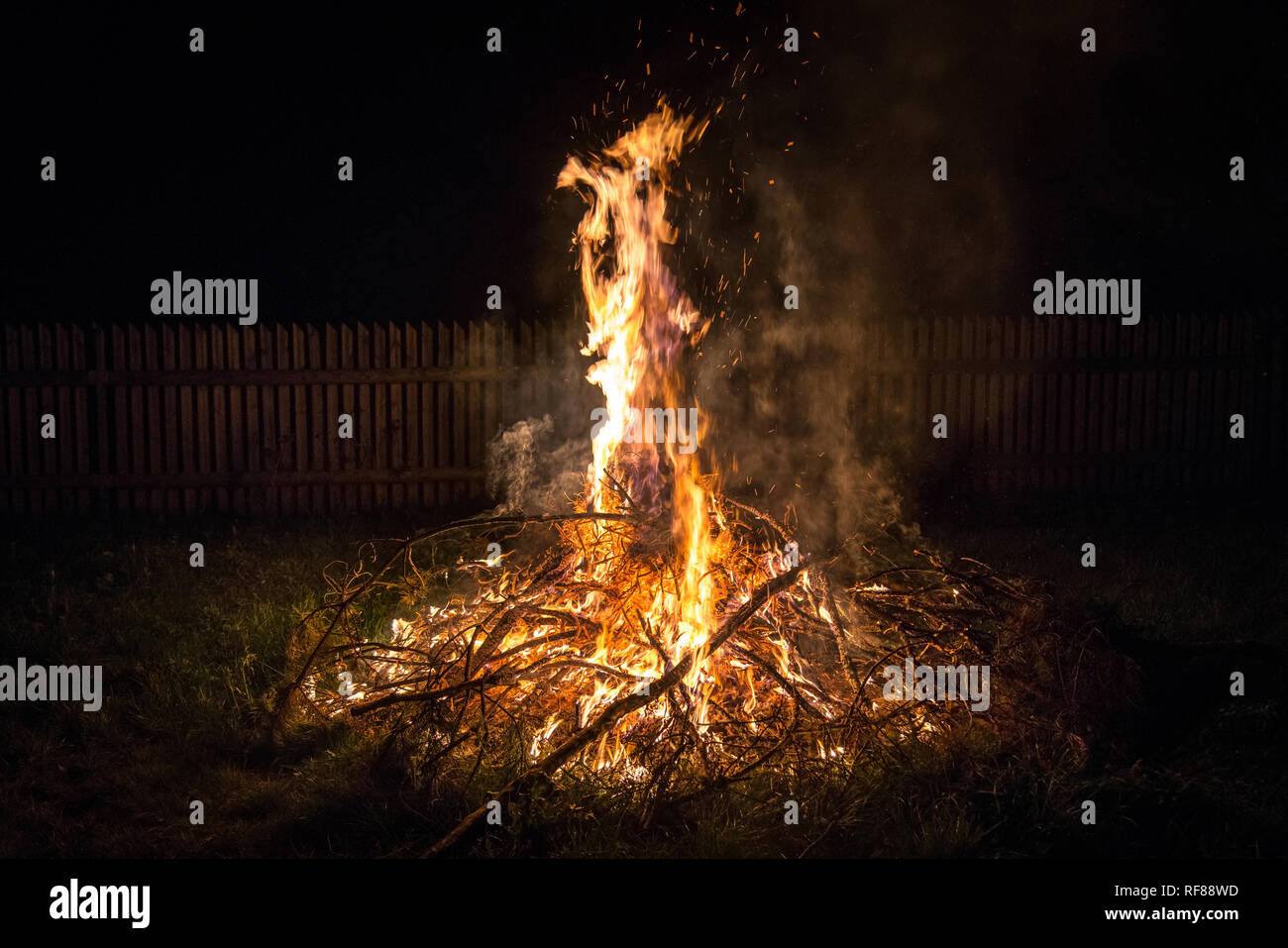 Outdoor bonfire. Camping in the nature outdoors in the woods and having ...