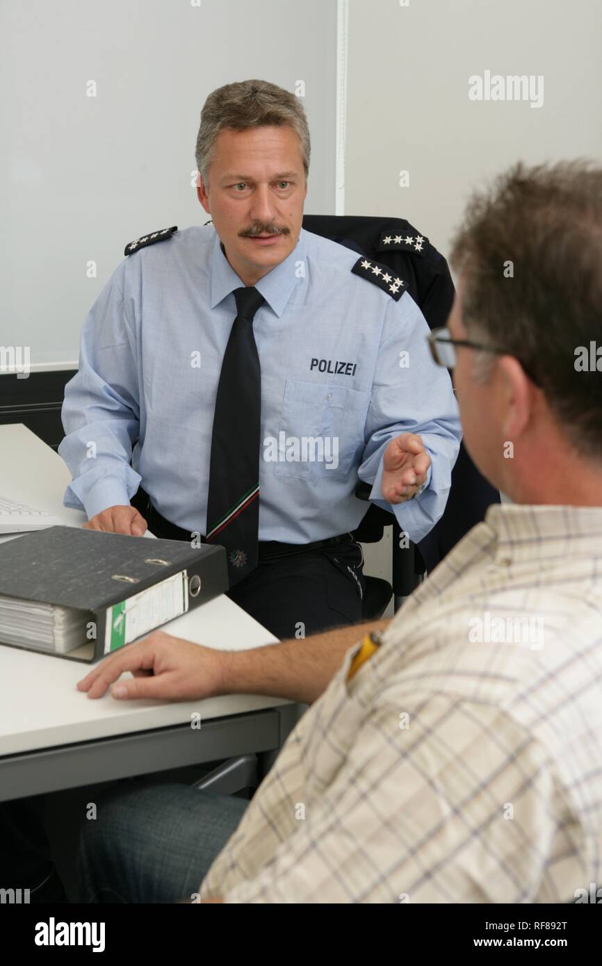 Police officer at the office, new blue police uniforms worn by 1400 ...