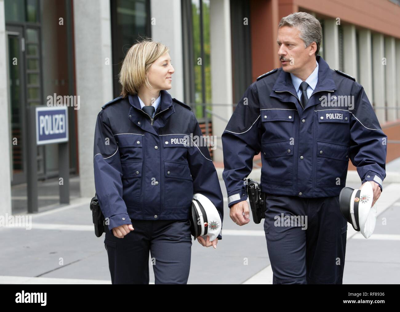 New blue police uniforms worn by 1400 male and female North Rhine ...