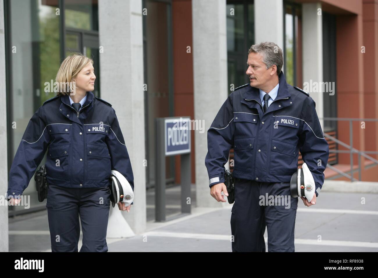 New blue police uniforms worn by 1400 male and female North Rhine ...
