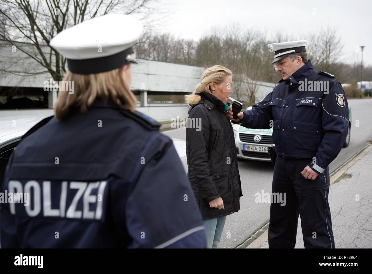 Traffic check, New blue police uniforms worn by 1400 male and female ...
