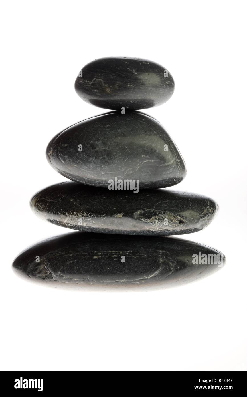 Smooth pebbles, stacked, in-studio still-life shot Stock Photo - Alamy