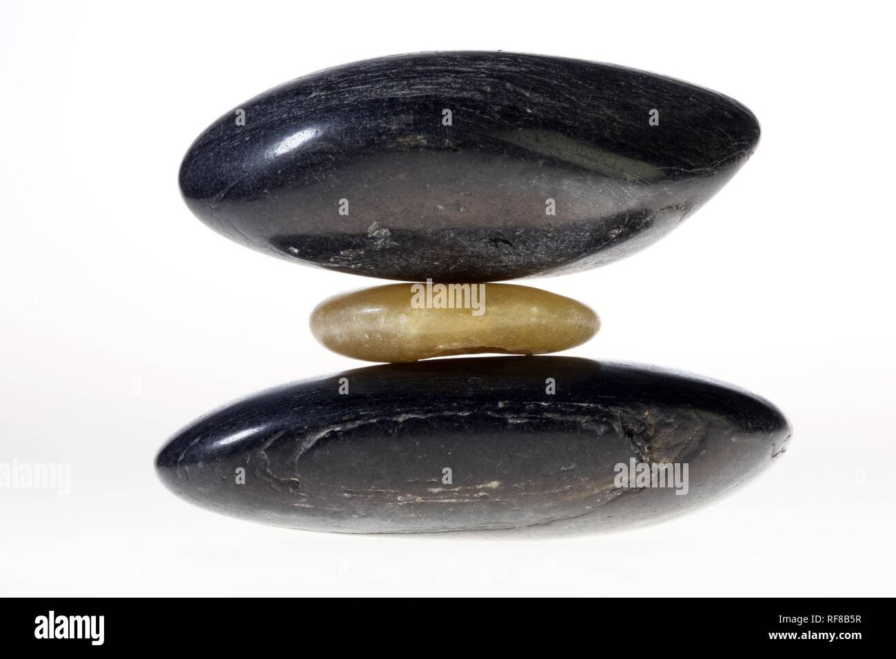 Pebble gathering Cut Out Stock Images & Pictures - Alamy