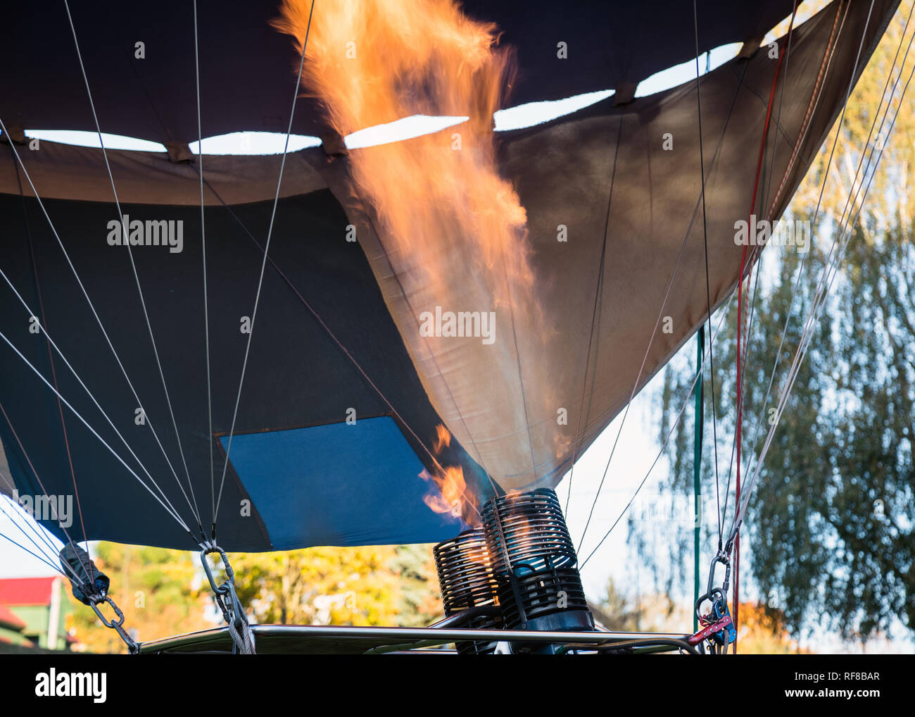 Hot air balloon. Aerostat with bright burning fire flame fuelled by gas ...