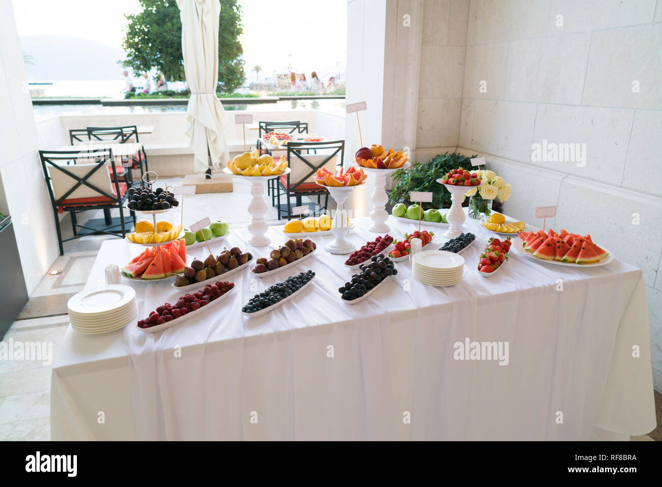 Banquet table full of fruits and berries, close up Stock Photo - Alamy