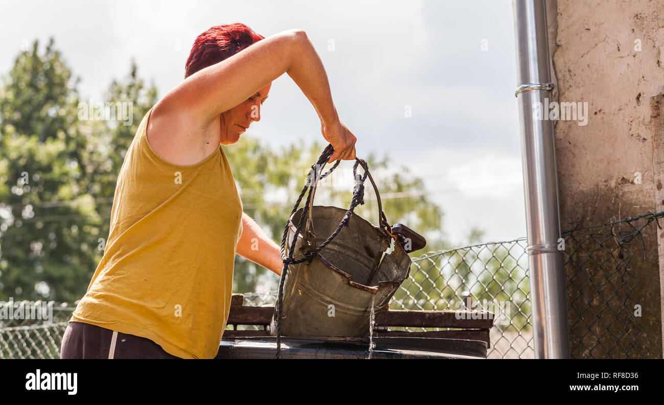 Pulling Water From Well High Resolution Stock Photography and Images ...