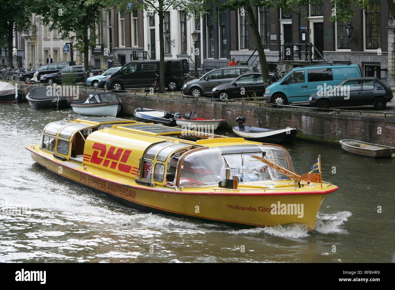 DHL courier service canal boat, Amsterdam, The Netherlands, Europe ...