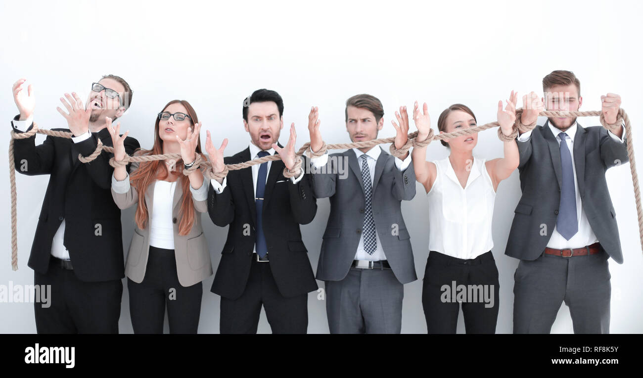 scared group of business people tied with a rope Stock Photo - Alamy