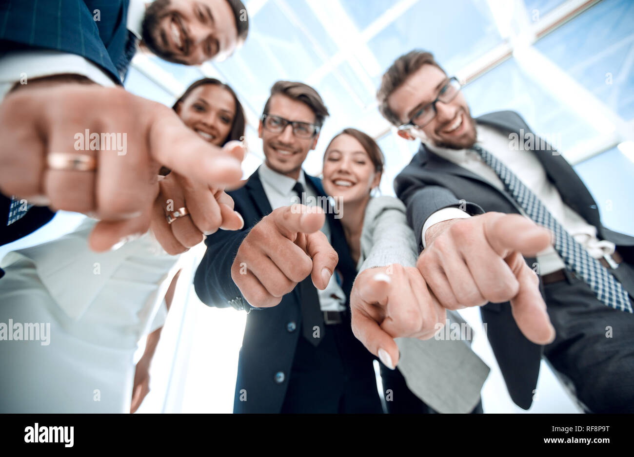 close up.business team pointing at you Stock Photo - Alamy