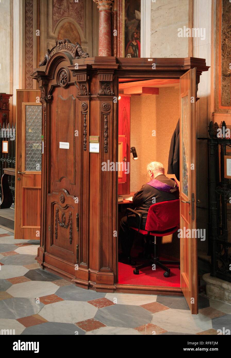 Priest confessional hi-res stock photography and images - Alamy