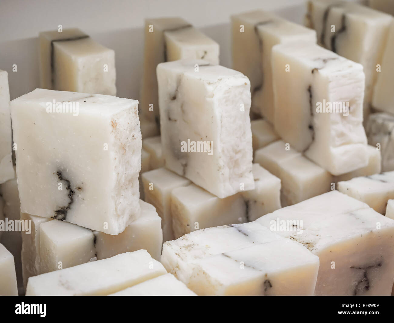 Bars of soap on a shop window. Pure natural soap with cedar oil and ...