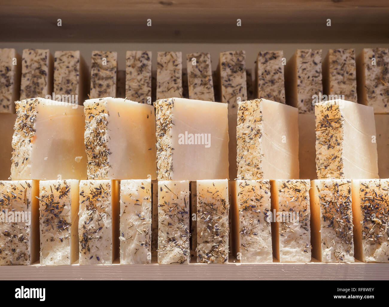 Bars of soap on a shop window. Lavender soap with natural cedar oil ...