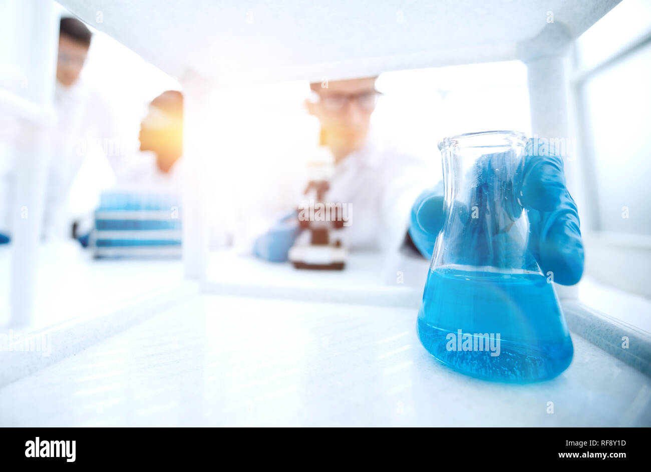 background image of scientists in the laboratory Stock Photo - Alamy