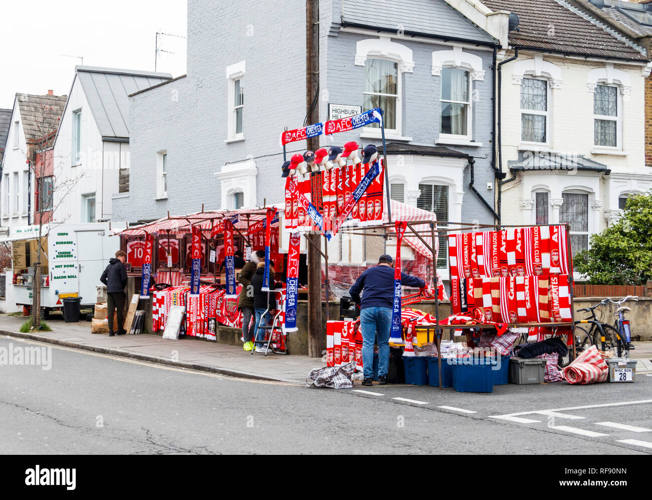 Stalls setting up opposite Arsenal tube station, on a match day ...