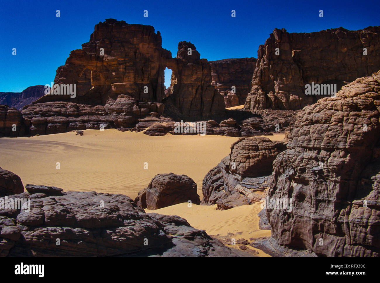 Africa, Algeria, Sahara, Tassili N'Ajjer National Park, Tadrart, rock towers and sand dunes ...