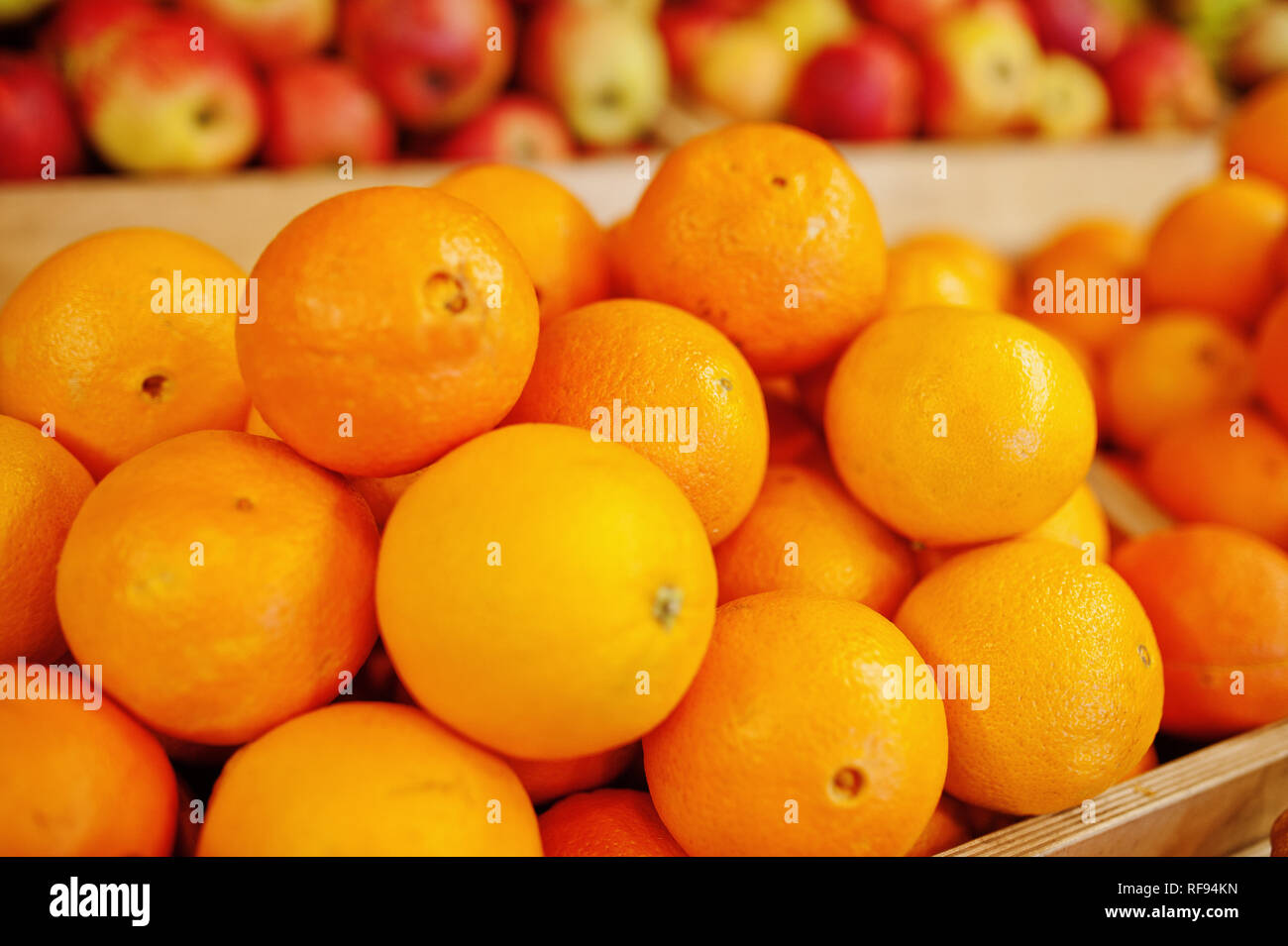 Colorful shiny fresh fruits. Oranges on the shelf of a supermarket or ...
