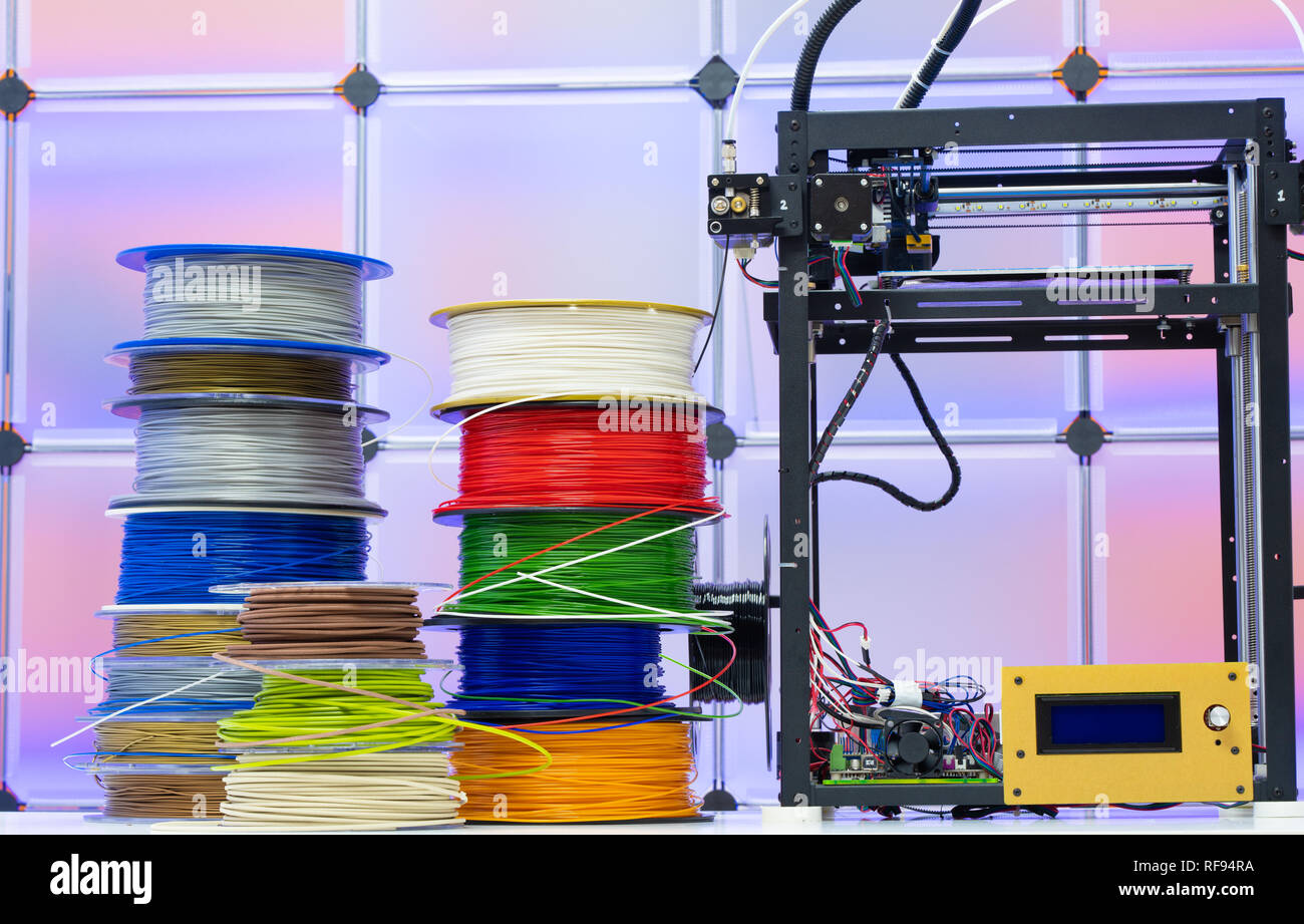 3D Printer and spools of plastic filaments Stock Photo - Alamy