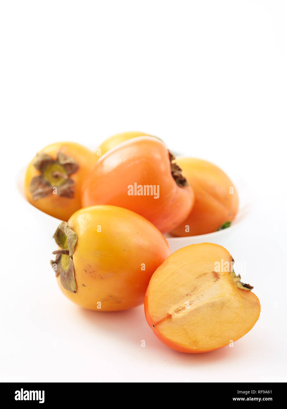 Sharon fruit still-life food photograph Stock Photo - Alamy