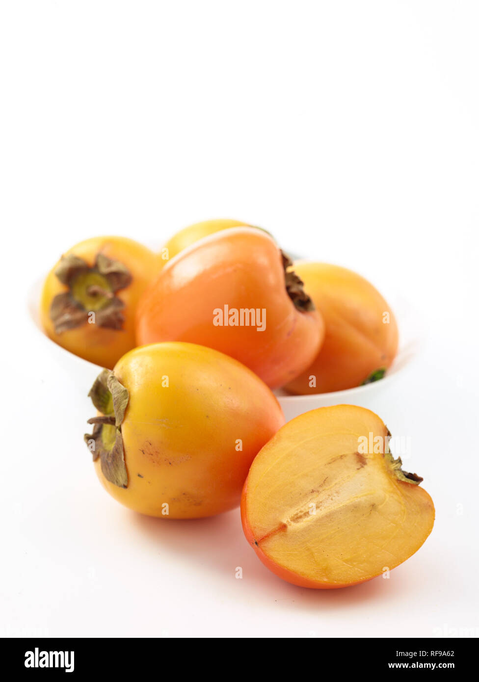 Sharon fruit still-life food photograph Stock Photo - Alamy