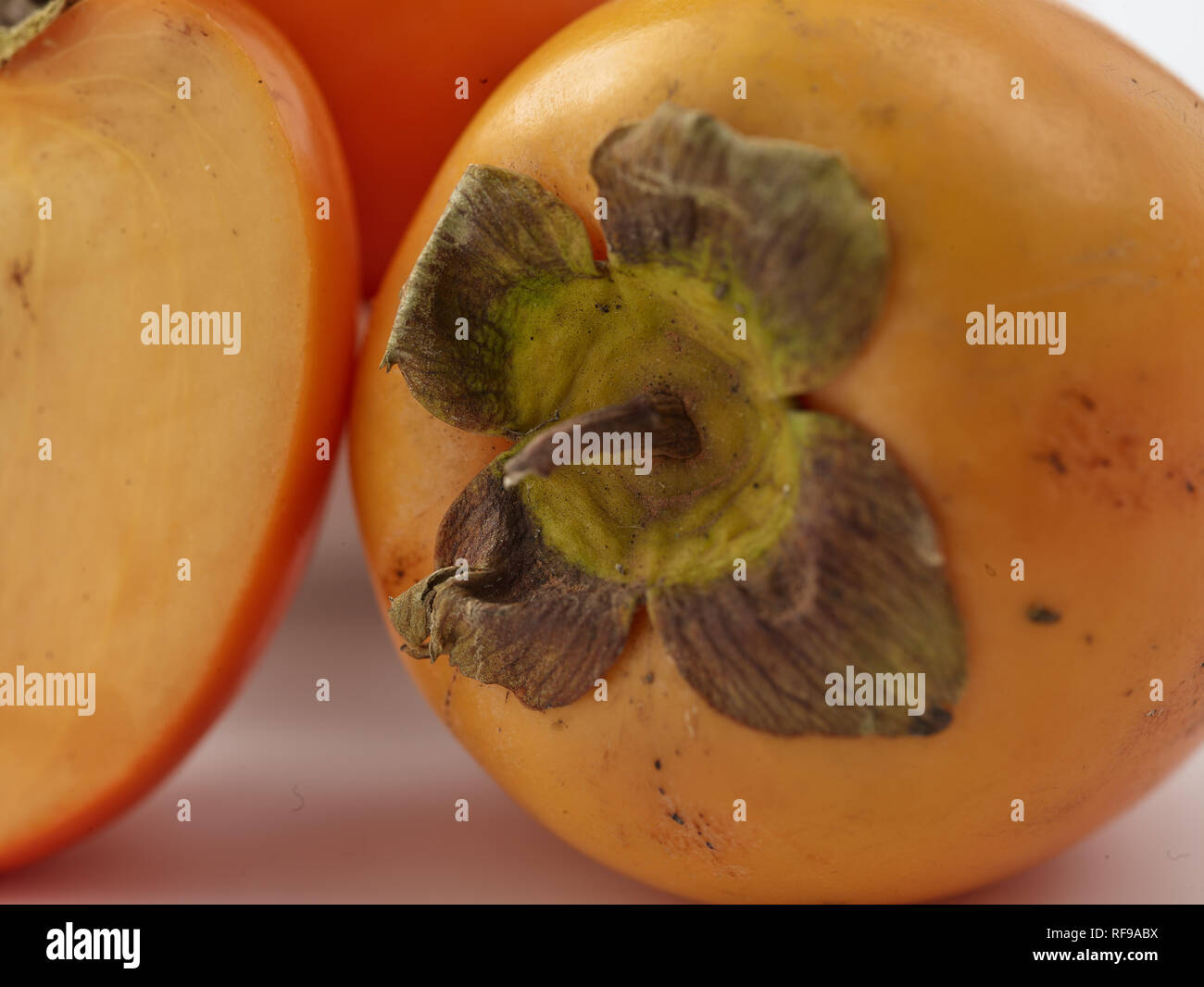 Persimmon, Sharon fruit, food still-life photograph Stock Photo - Alamy