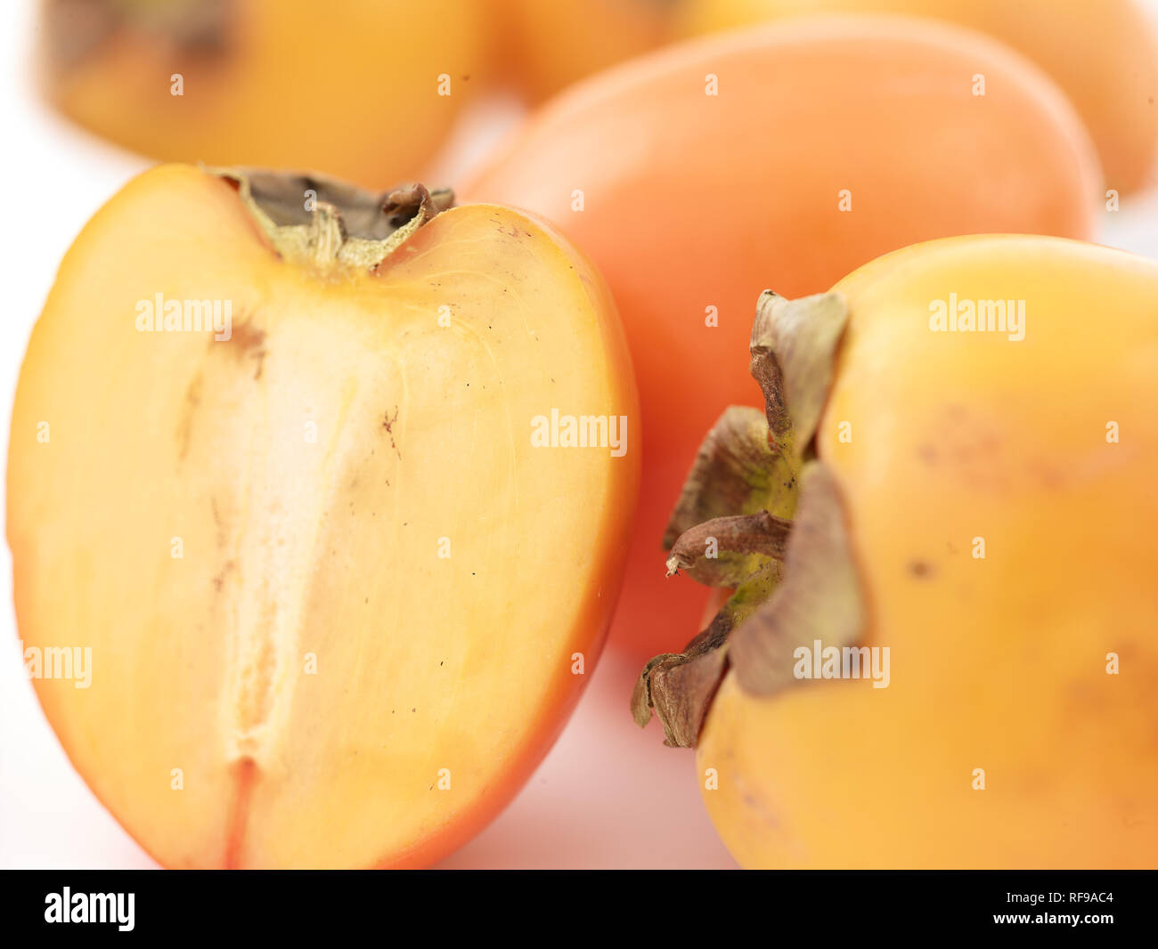 Persimmon, Sharon fruit, food still-life photograph Stock Photo - Alamy
