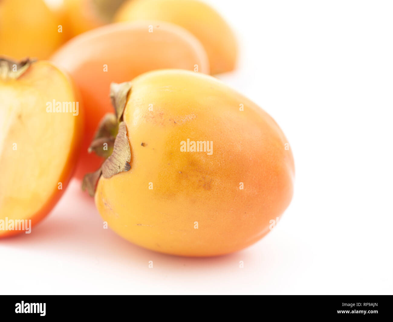 Persimmon, Sharon fruit, food still-life photograph Stock Photo - Alamy