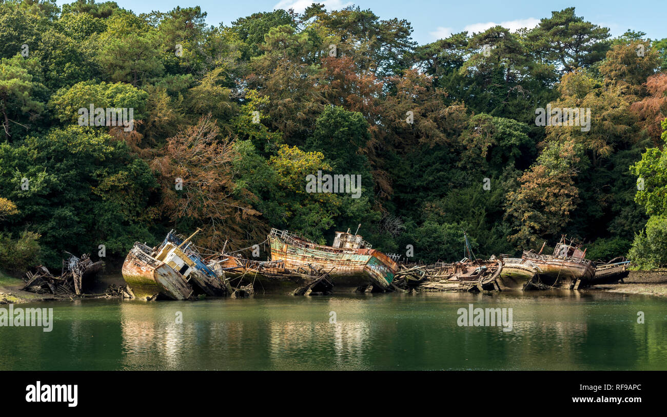 Old fishing boats in ship graveyard Stock Photo - Alamy