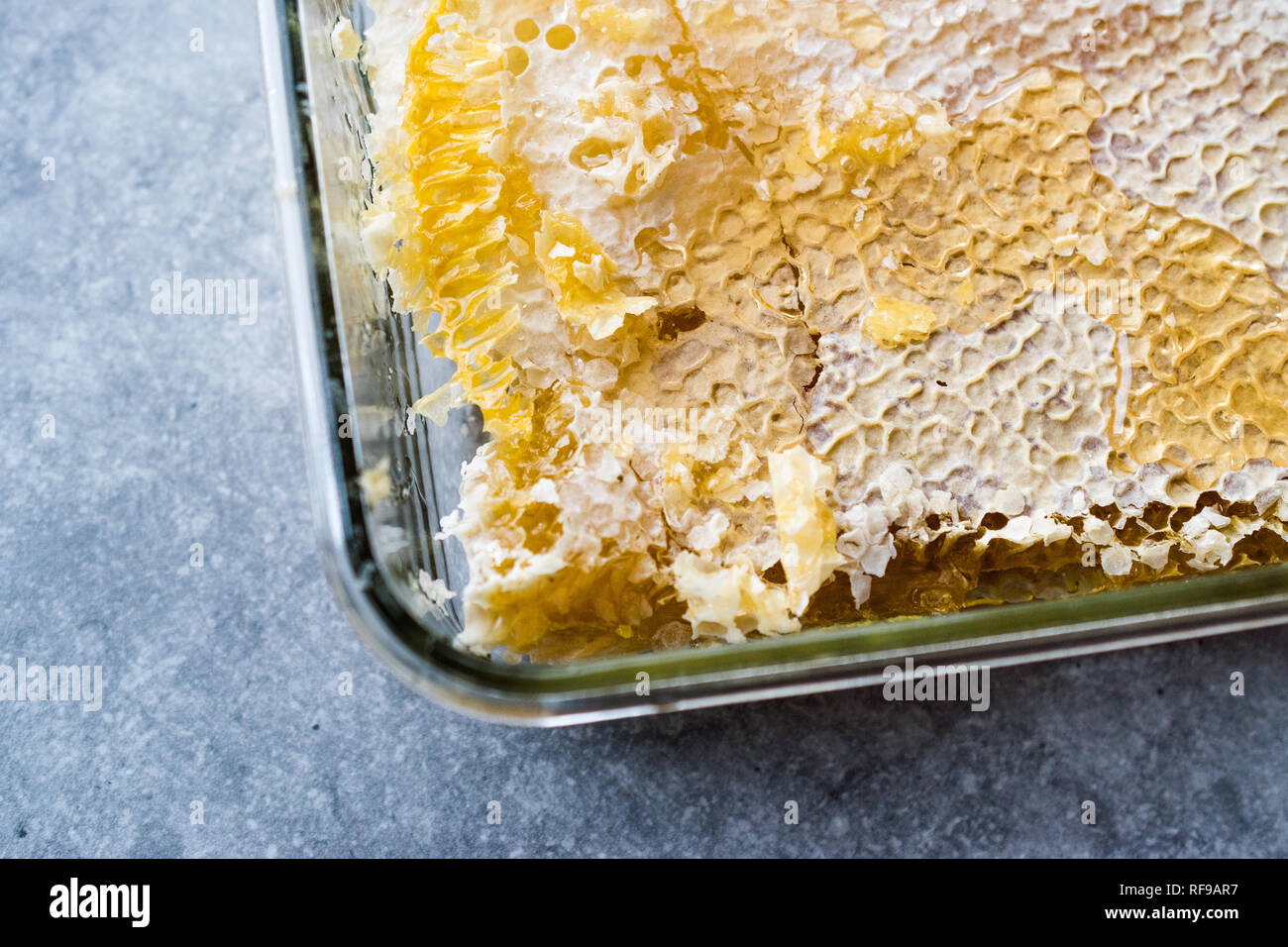 Fresh Honeycomb Pieces with Honey in Glass Bowl. Organic Food Stock ...