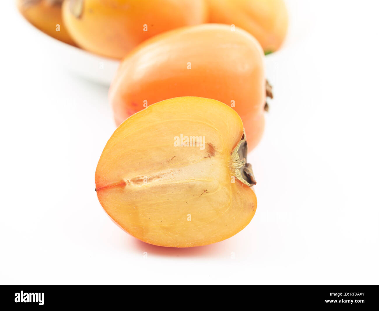 Persimmon, Sharon fruit, food still-life photograph Stock Photo - Alamy