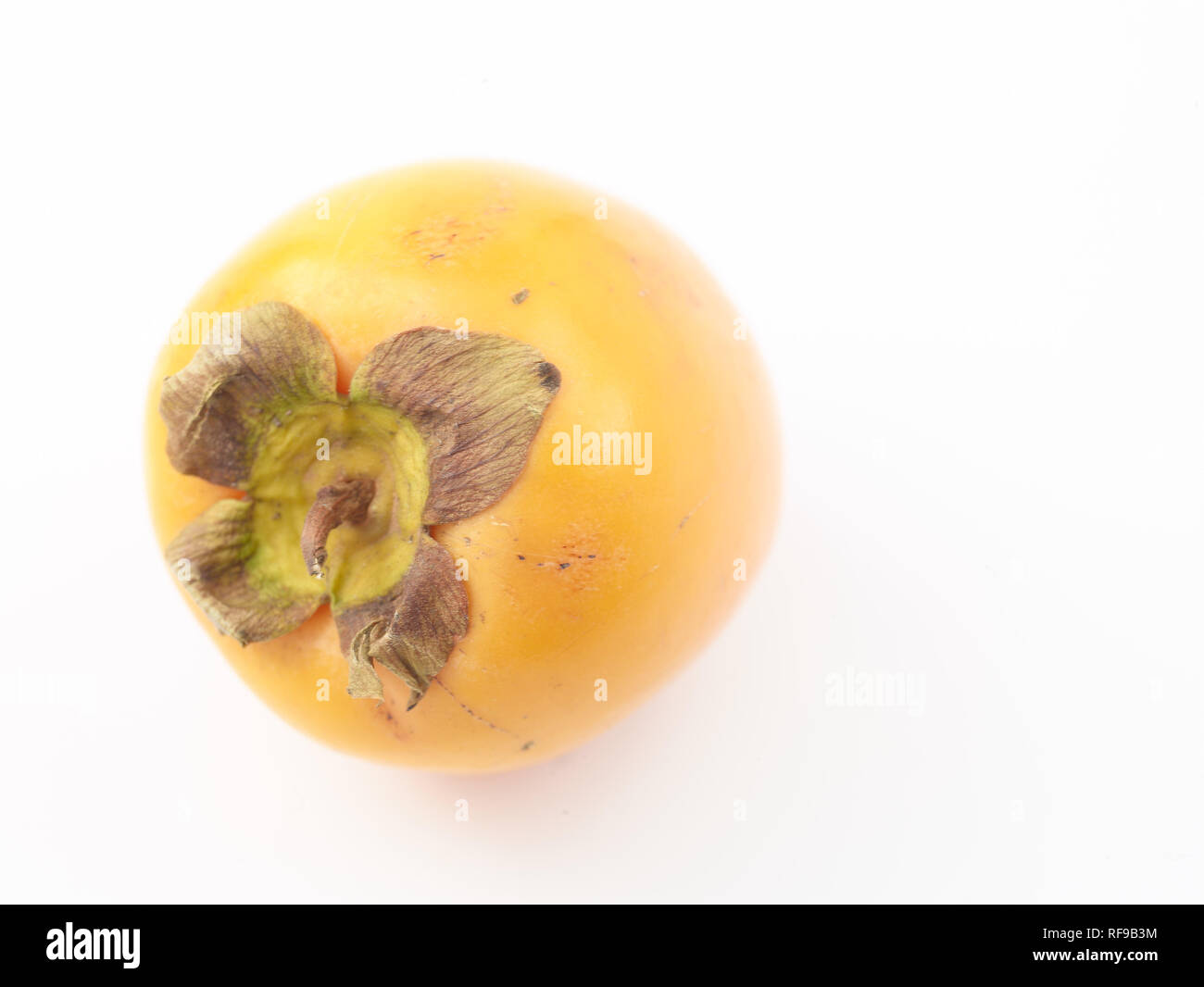 Persimmon, Sharon fruit, food still-life photograph Stock Photo - Alamy