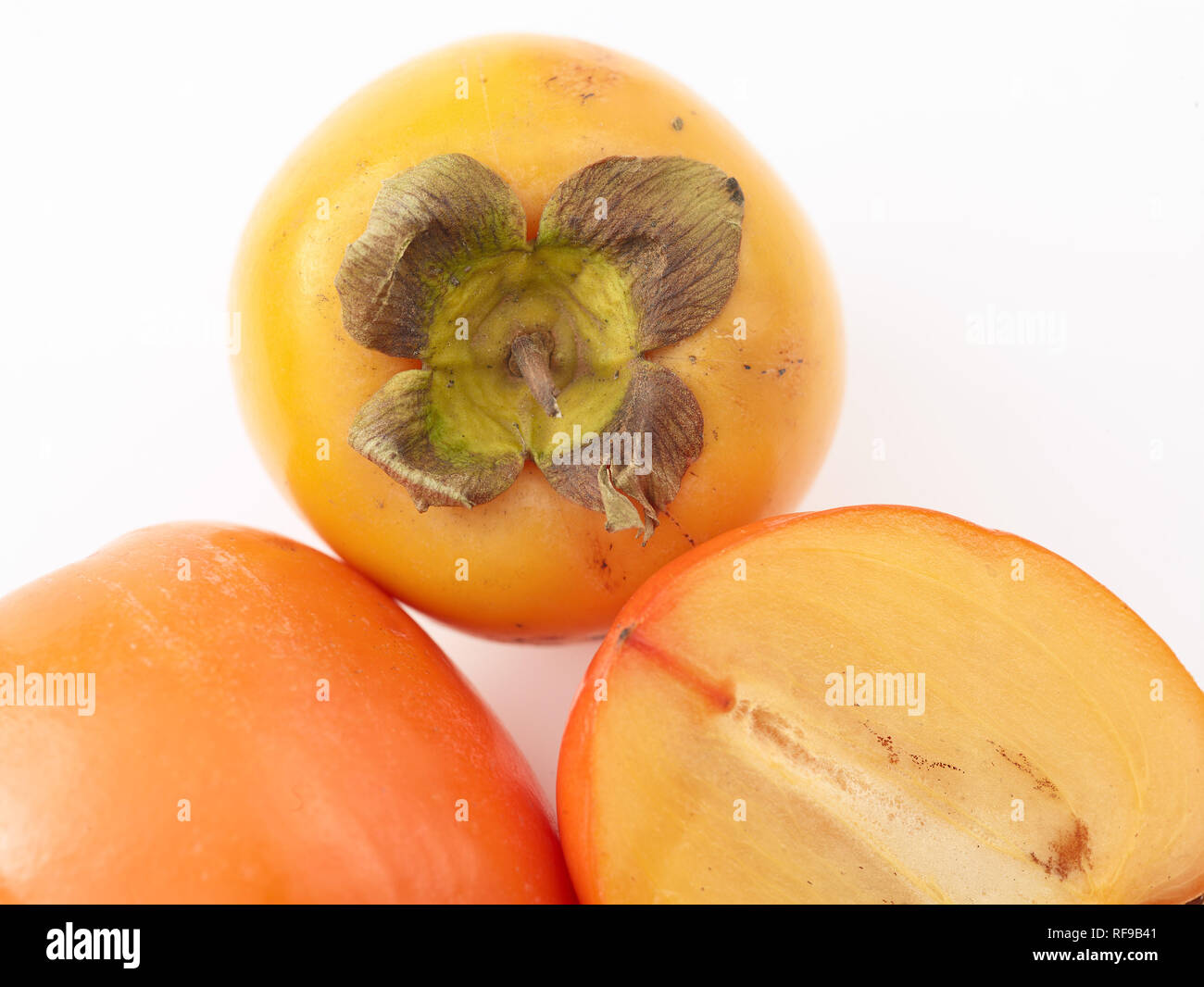 Persimmon, Sharon fruit, food still-life photograph Stock Photo - Alamy