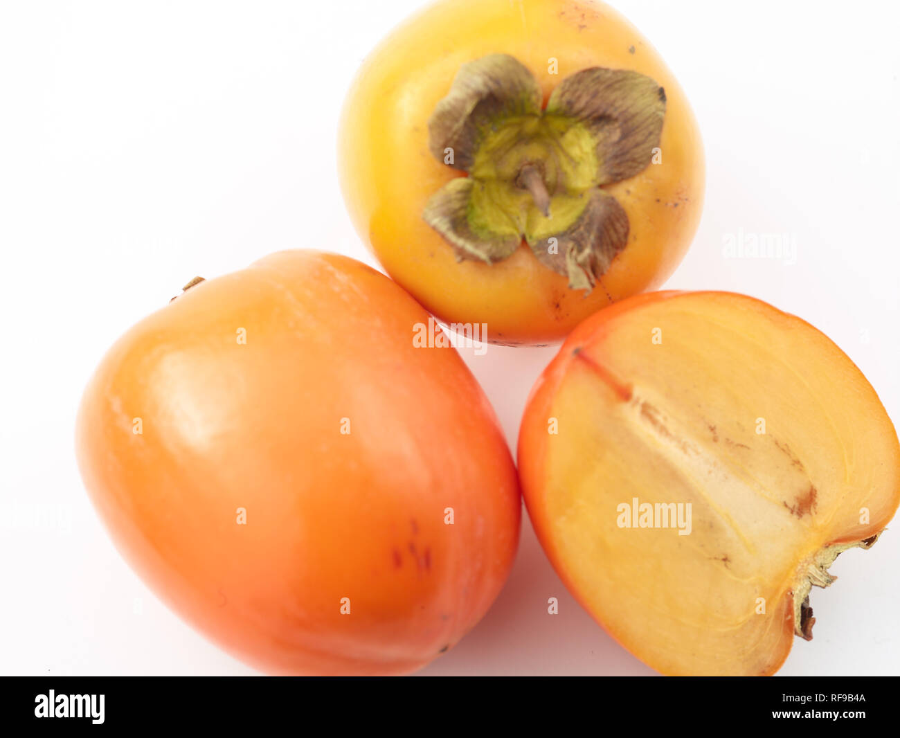 Persimmon, Sharon fruit, food still-life photograph Stock Photo - Alamy