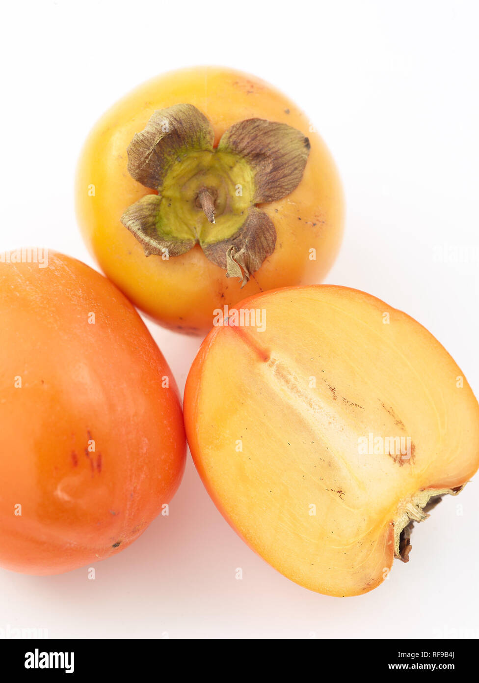 Persimmon, Sharon fruit, food still-life photograph Stock Photo - Alamy
