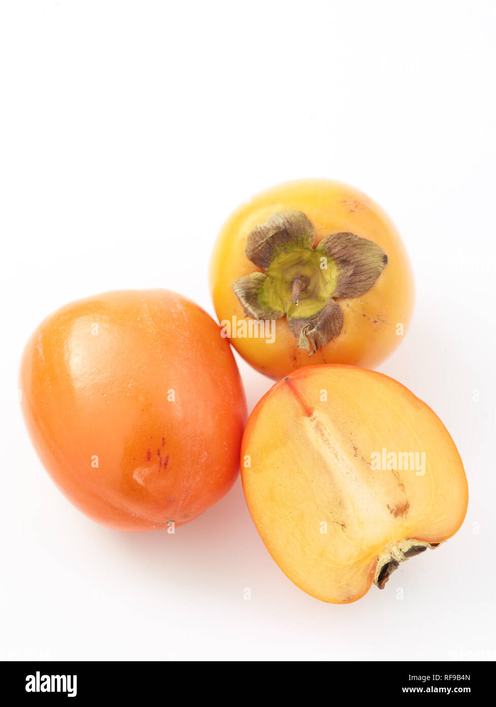 Persimmon, Sharon fruit, food still-life photograph Stock Photo - Alamy