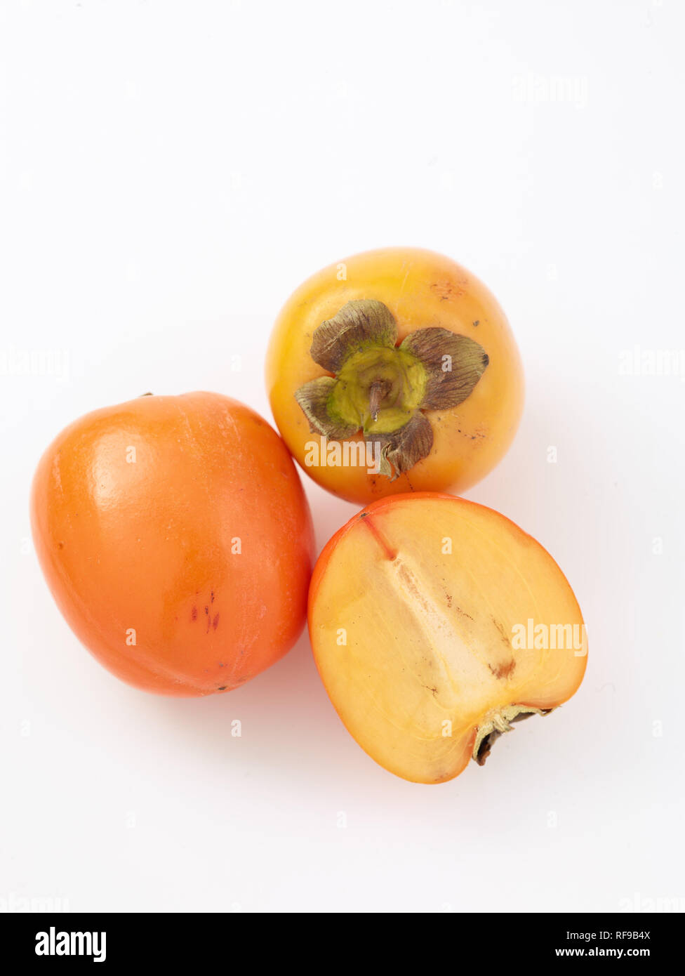 Persimmon, Sharon fruit, food still-life photograph Stock Photo - Alamy